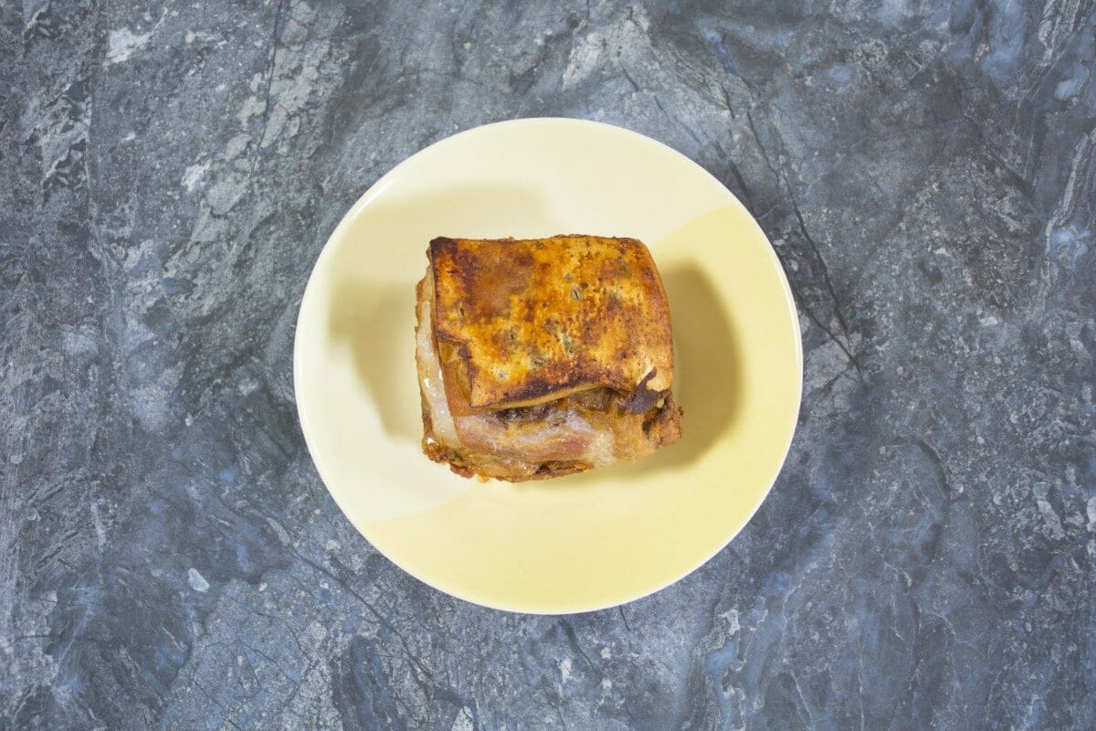 Pork belly sisig recipe: sizzling hot plate Filipino favorite - Taste ...